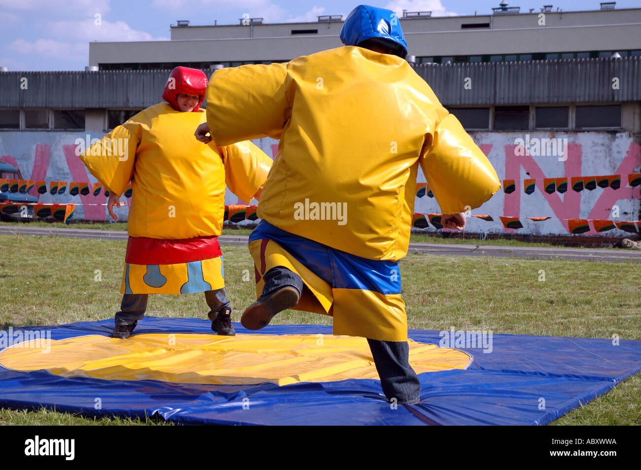 Funny sumo fighting parody in special costumes Stock Photo - Alamy