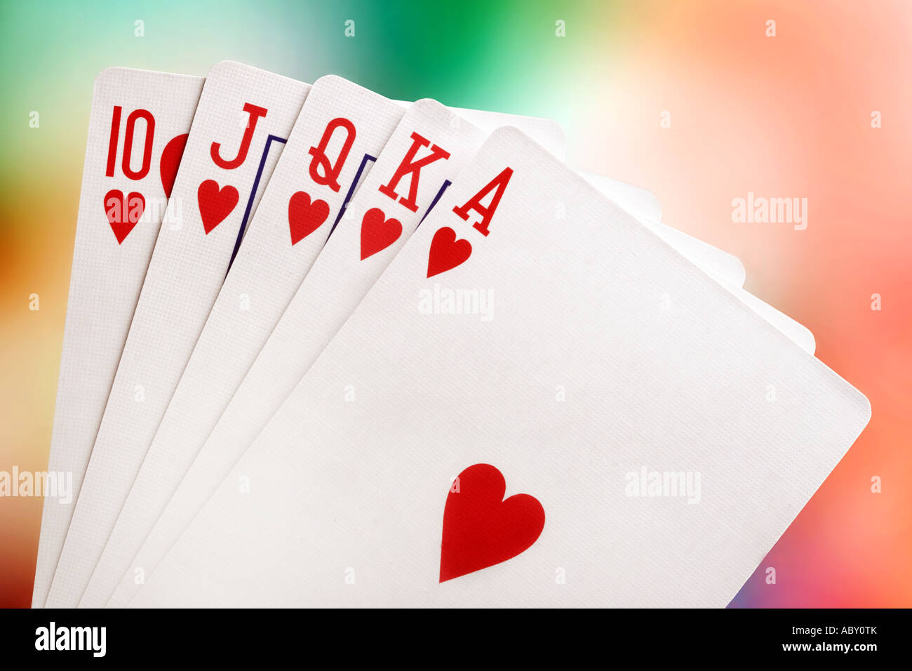 Royal flush with brightly coloured background Stock Photo - Alamy