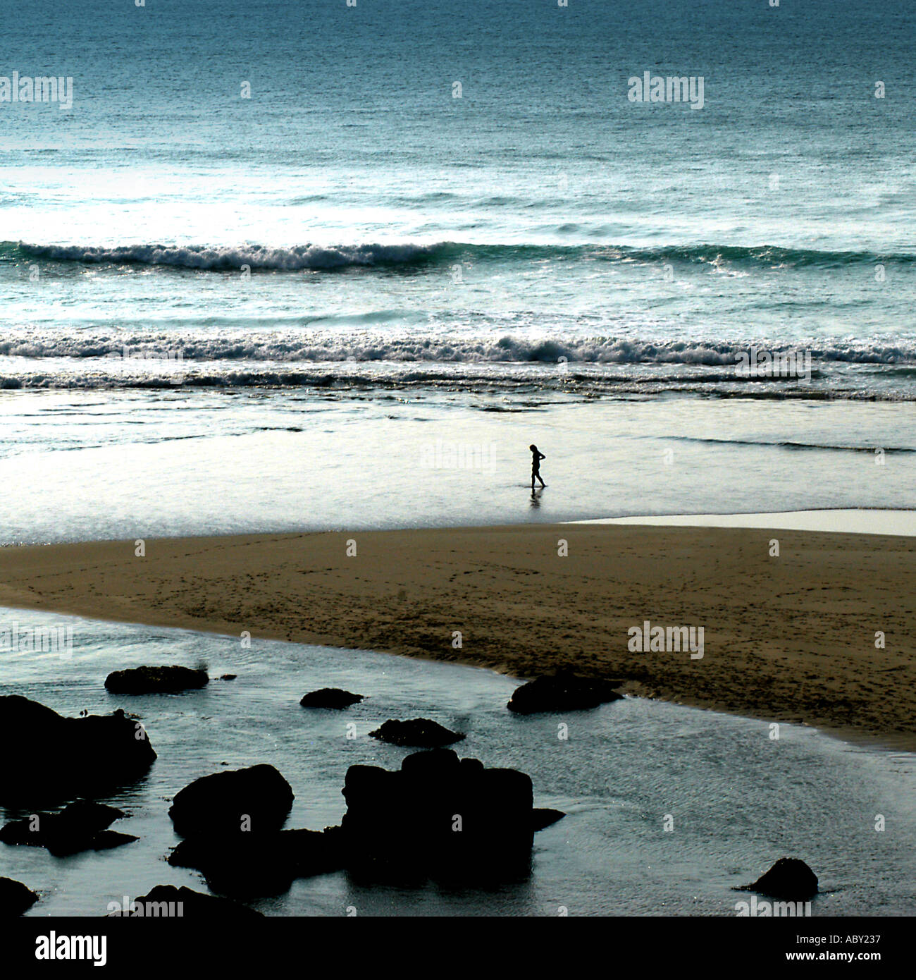 Lone person on beach hi-res stock photography and images - Alamy