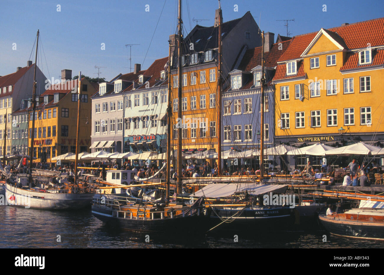 Buildings and boats in Nyhavn Copenhagen Denmark Stock Photo - Alamy