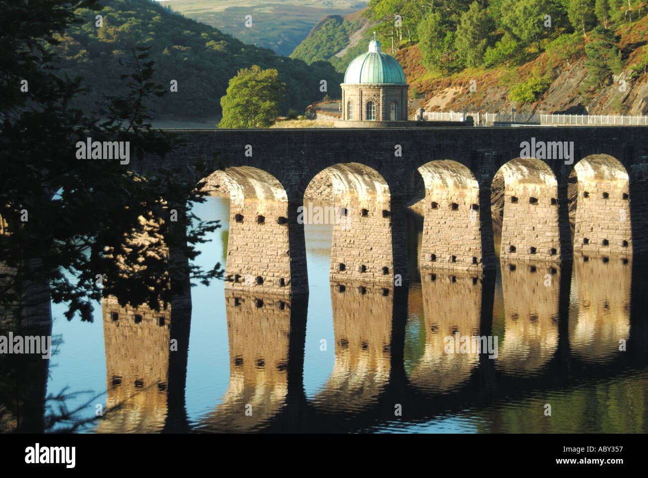 Stone arches for road bridge top of Garreg Ddu submerged dam reservoir ...