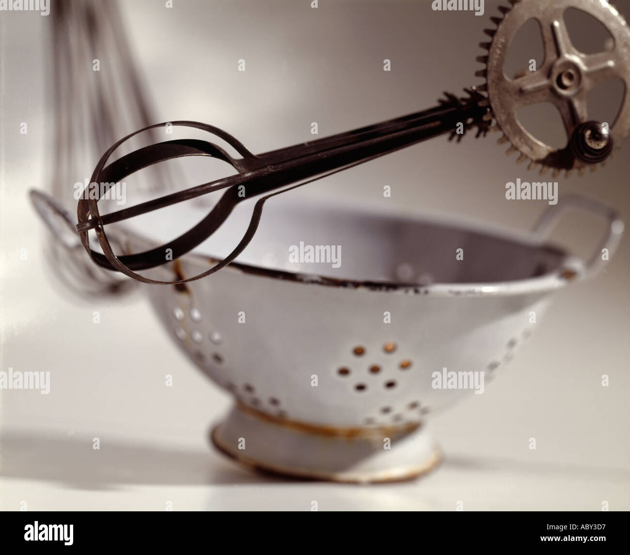 Whisk and colander Stock Photo - Alamy