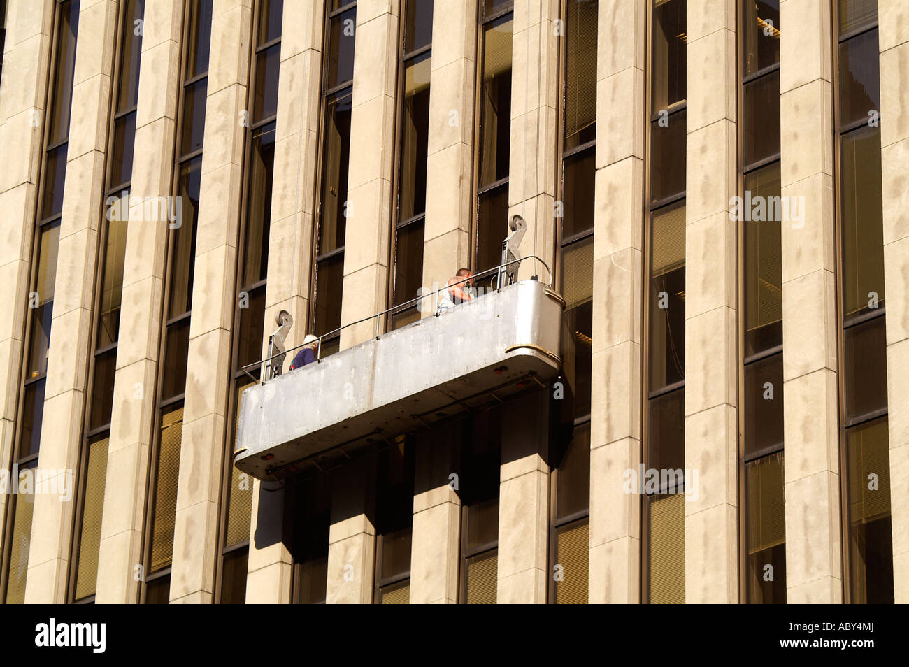 Skyscraper window cleaner Stock Photo - Alamy