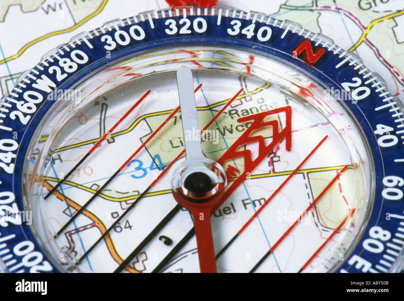 Compass and Map Stock Photo - Alamy