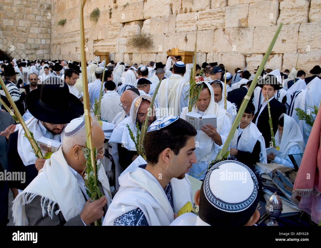 Israel Jerusalem Old City western Wall group of jews praying with Luavs ...