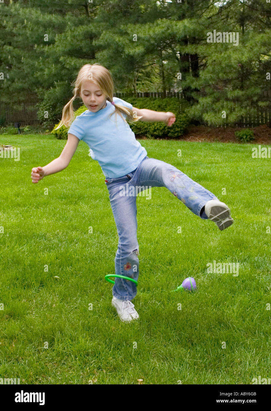 Child playing skip it Stock Photo - Alamy