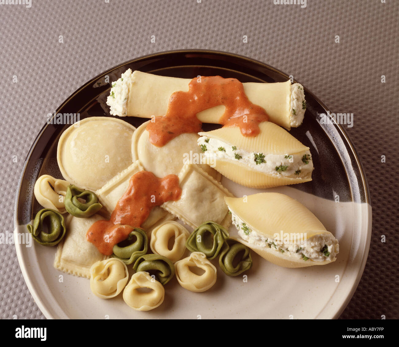 assortment Italian pasta stuffed shells ravioli manicotti tortellini ...