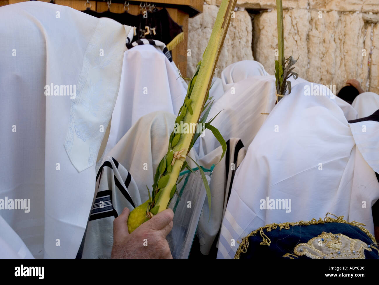 Israel Jerusalem Old City Western Wall group of jews covered with their ...