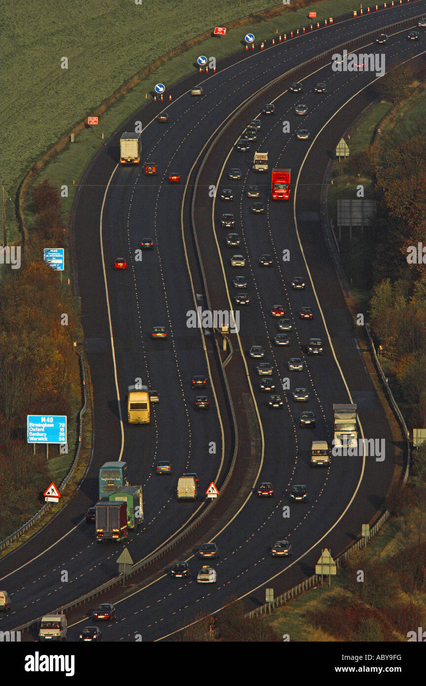 Traffic on the M40 motorway snaking through the Oxfordshire countryside ...