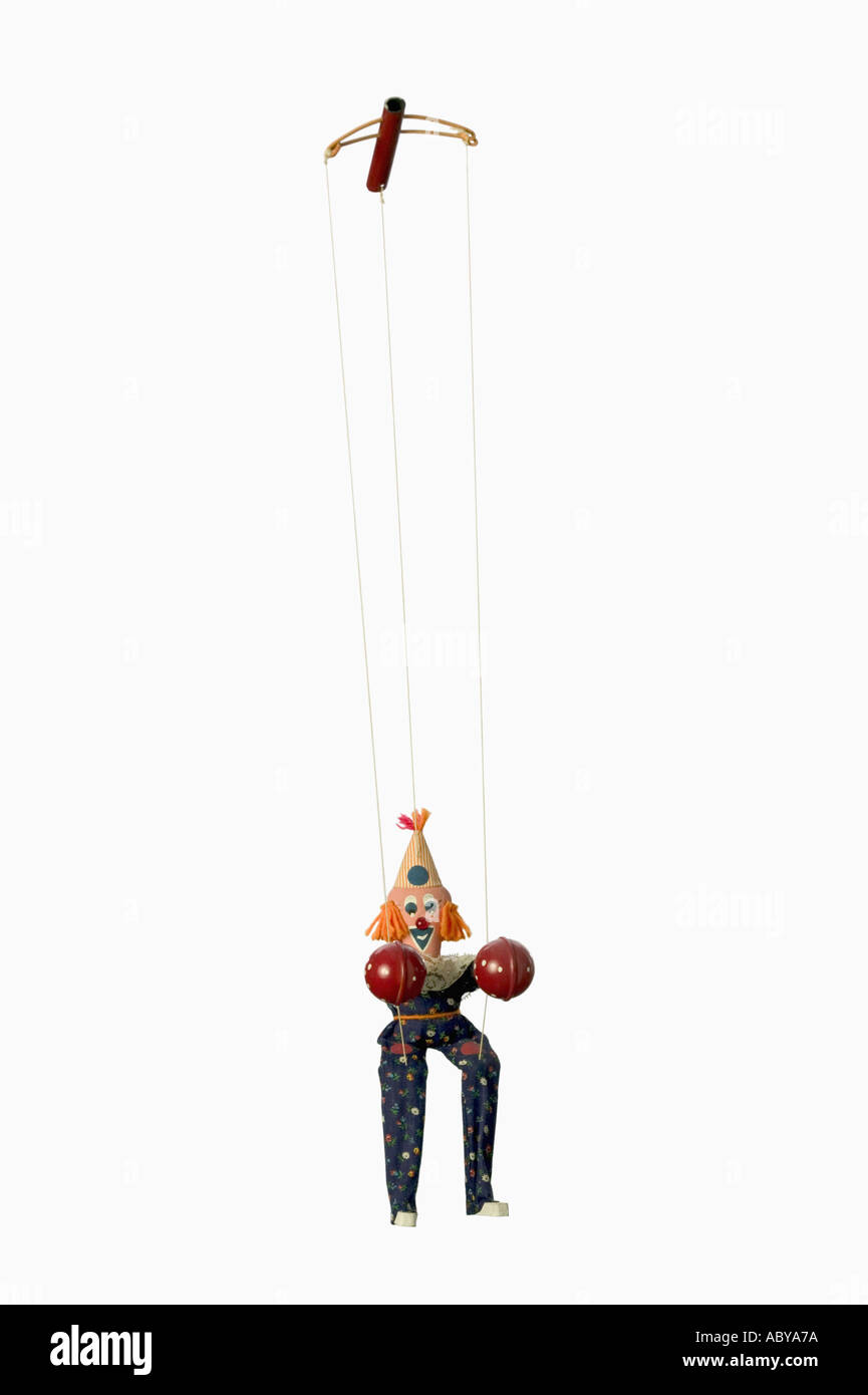 Still life of a Marionette clown with two red balls for hands ...