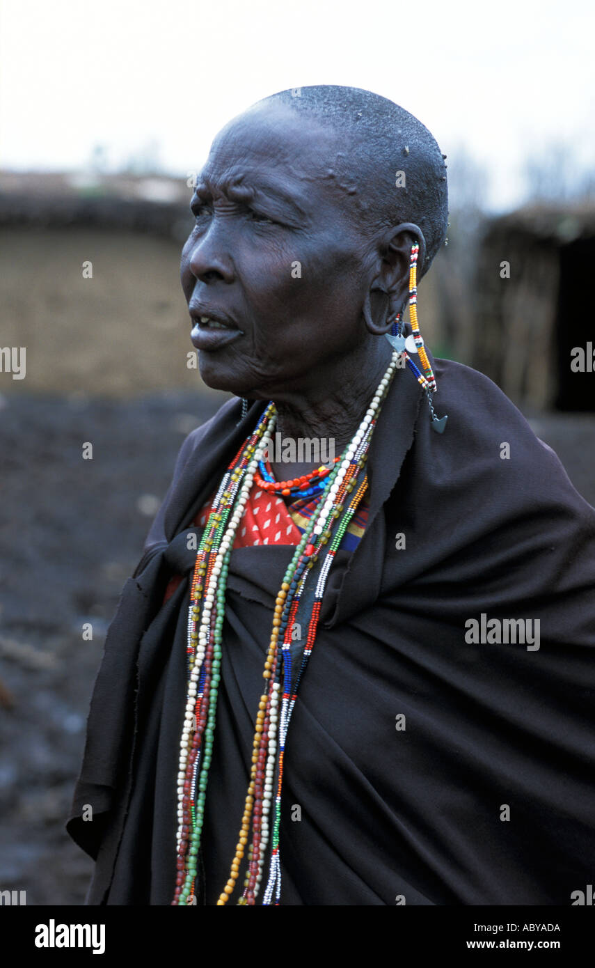 AFRICA KENYA Masai Mara National Reserve Elderly Masai woman with ...