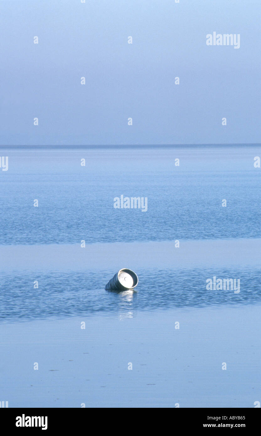 Floating metal drum Stock Photo - Alamy