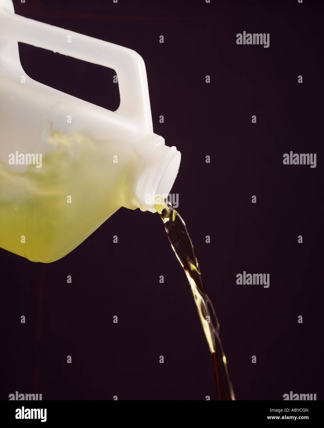 pour pouring liquid bottle close up copy space Stock Photo - Alamy