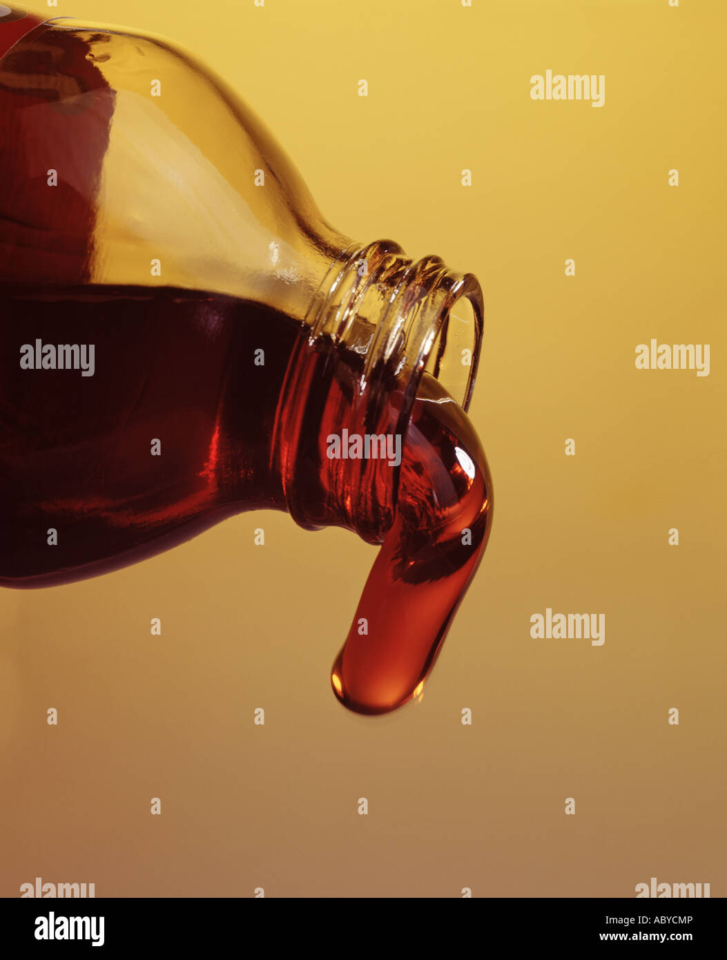 pour pouring syrup bottle close up Stock Photo - Alamy