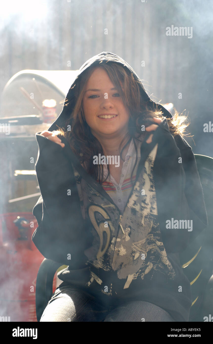 Sitting beside fire hi-res stock photography and images - Alamy