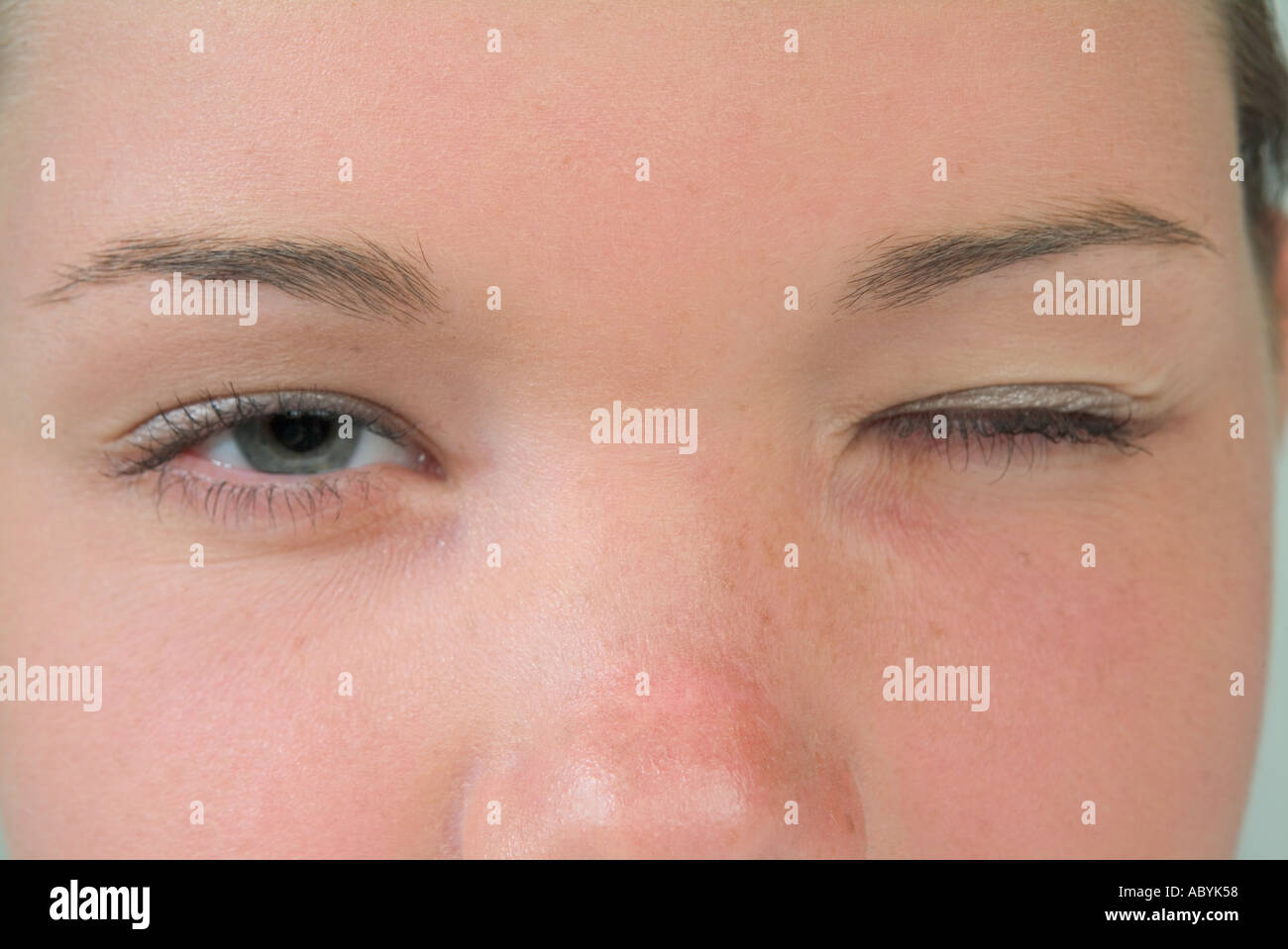 Close up of a teenage girl winking Stock Photo - Alamy Close up of a teenage girl winking Stock Photo - Alamy
