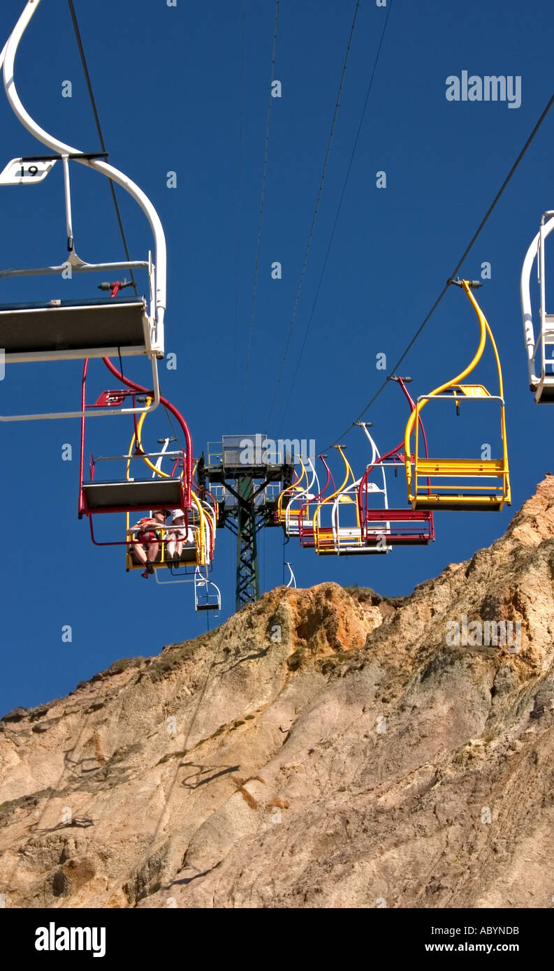 Chair lifts to Isle of Wight beach Stock Photo - Alamy