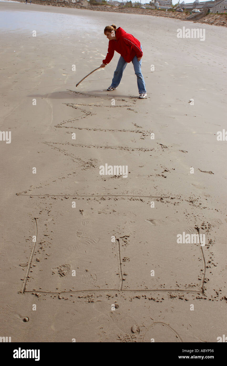 Stick writing in sand hi-res stock photography and images - Alamy