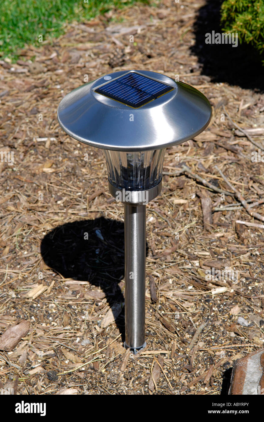 Solar energy lighting incorporated into patio lights Stock Photo - Alamy