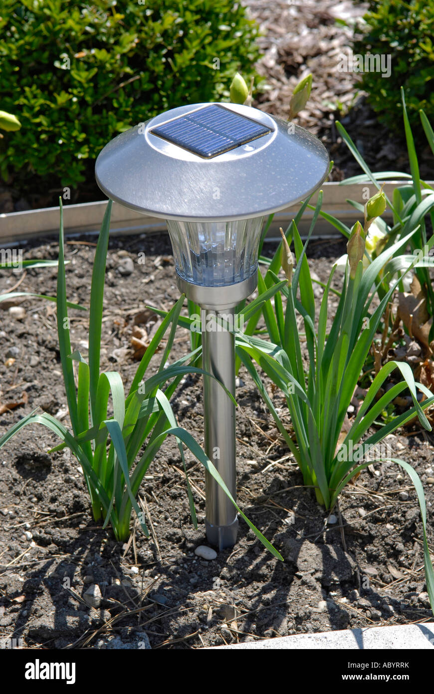 Solar energy lighting incorporated into patio lights Stock Photo - Alamy