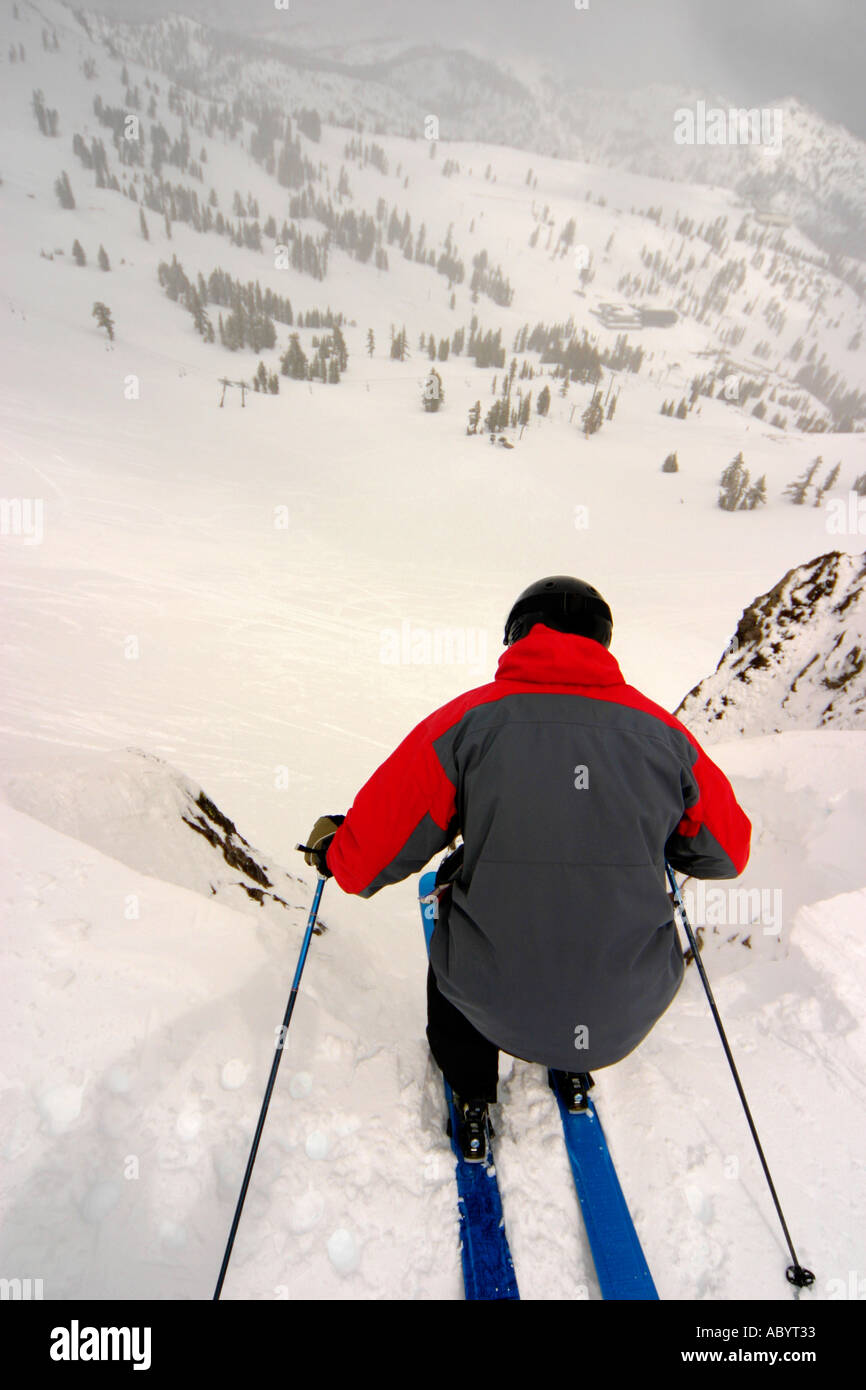 A skier drops into a narrow chute Stock Photo - Alamy