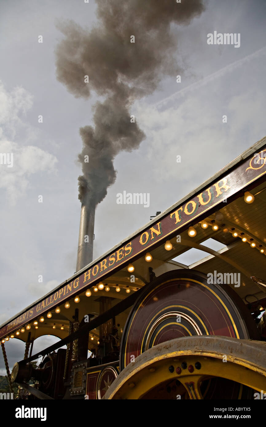 Smoke belching from the chimney of a working traction engine Wales UK ...
