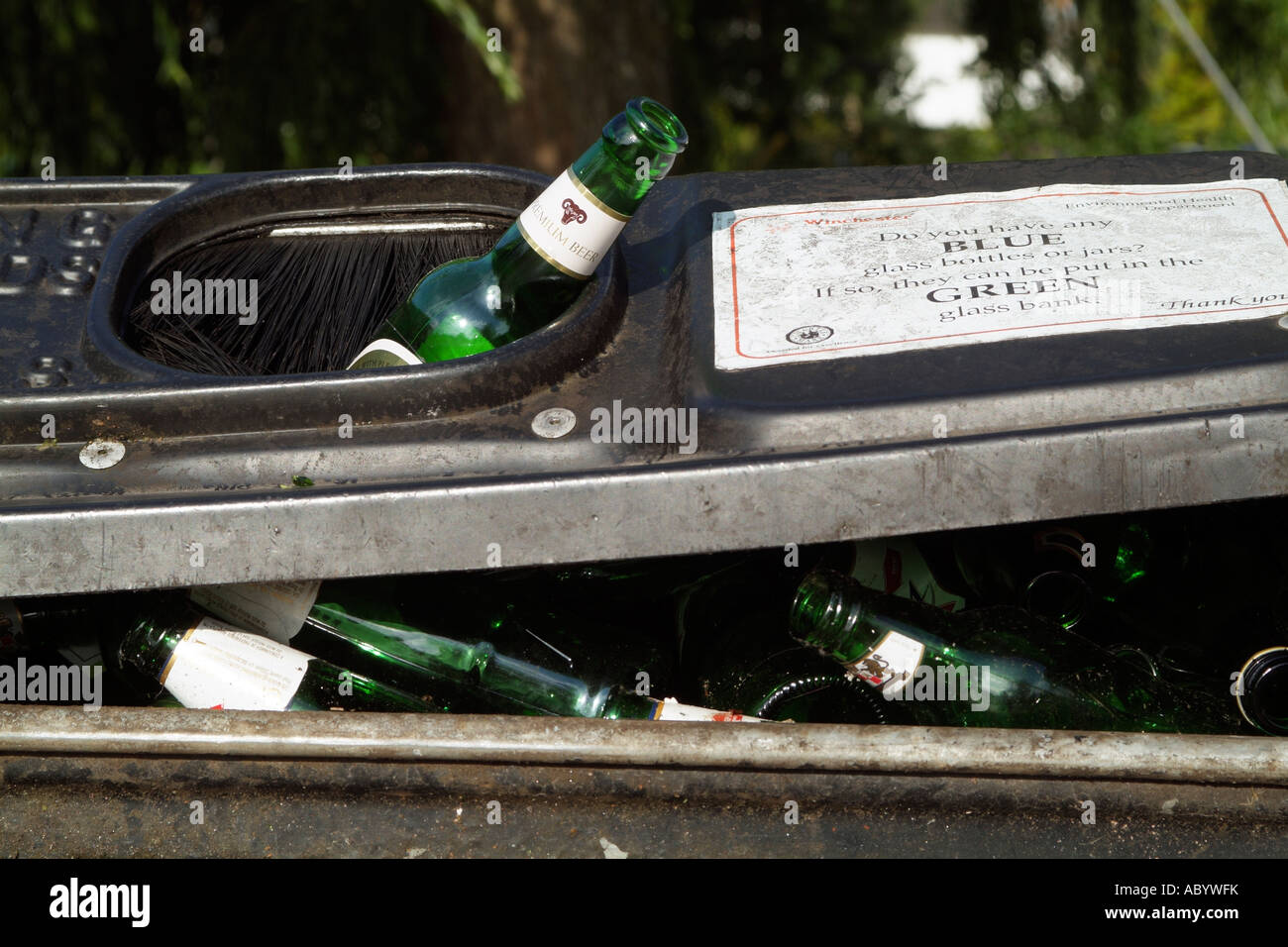 Glass recycling collection point Overfilled bins Stock Photo - Alamy