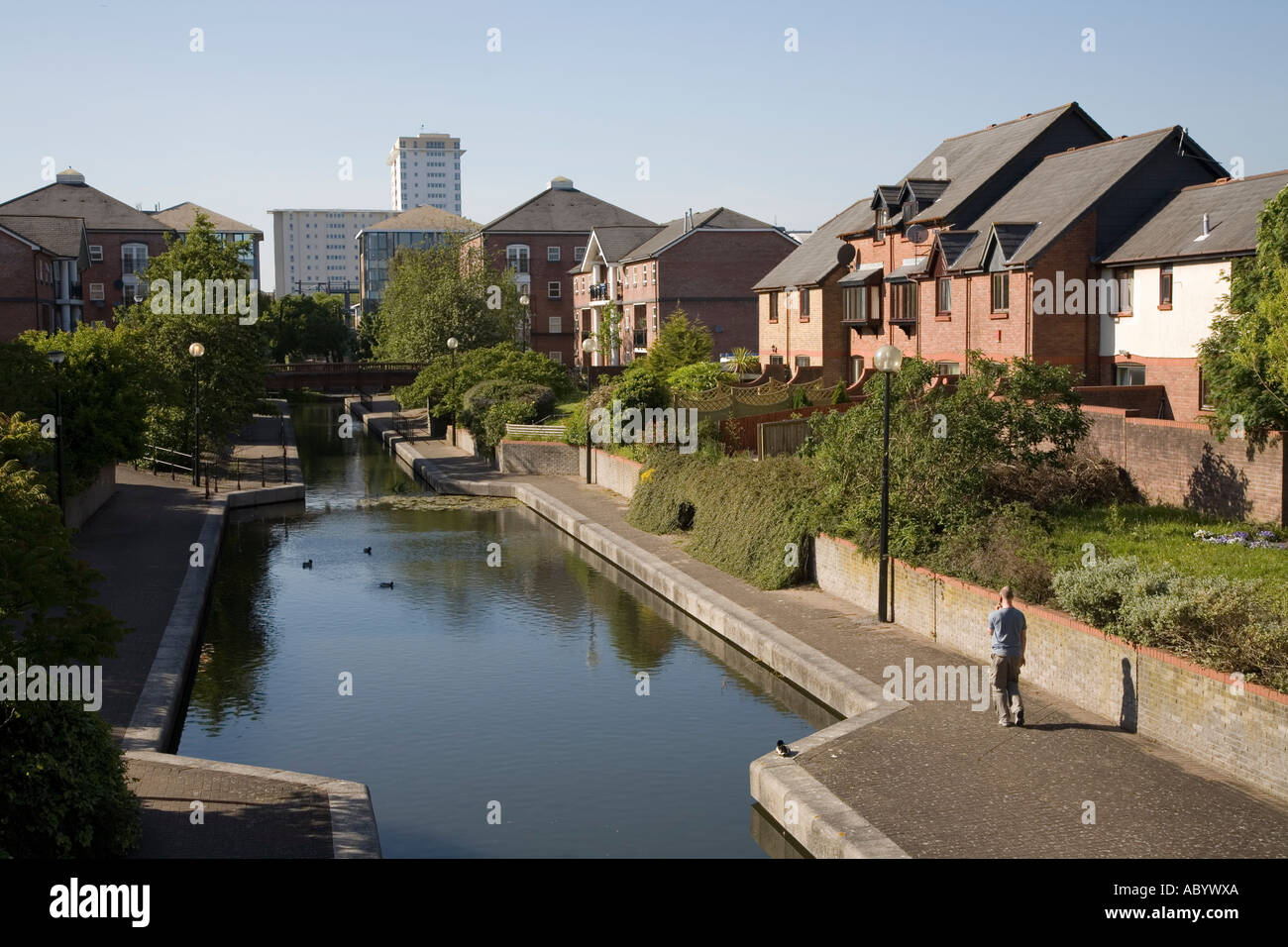 Disused canal now part of a modern housing development in the centre of ...