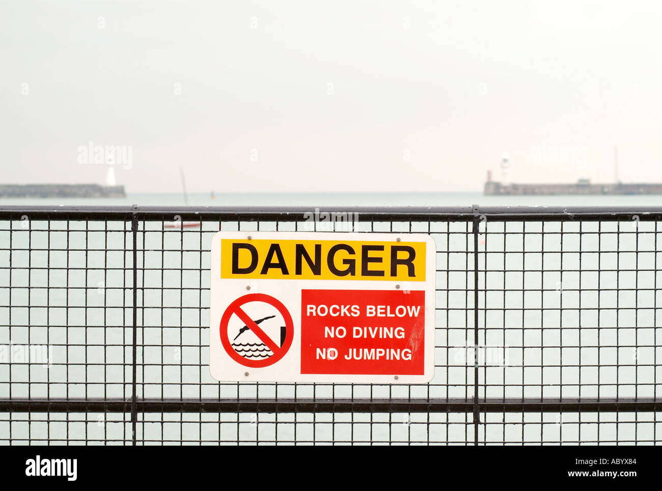 no swimming sign on beach by dover harbour danger warning Stock Photo ...