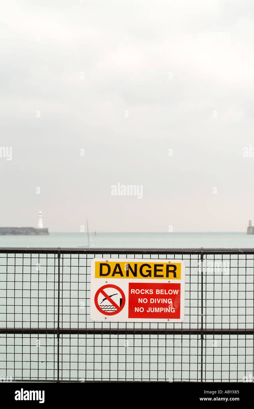 no swimming sign on beach by dover harbour danger warning Stock Photo ...