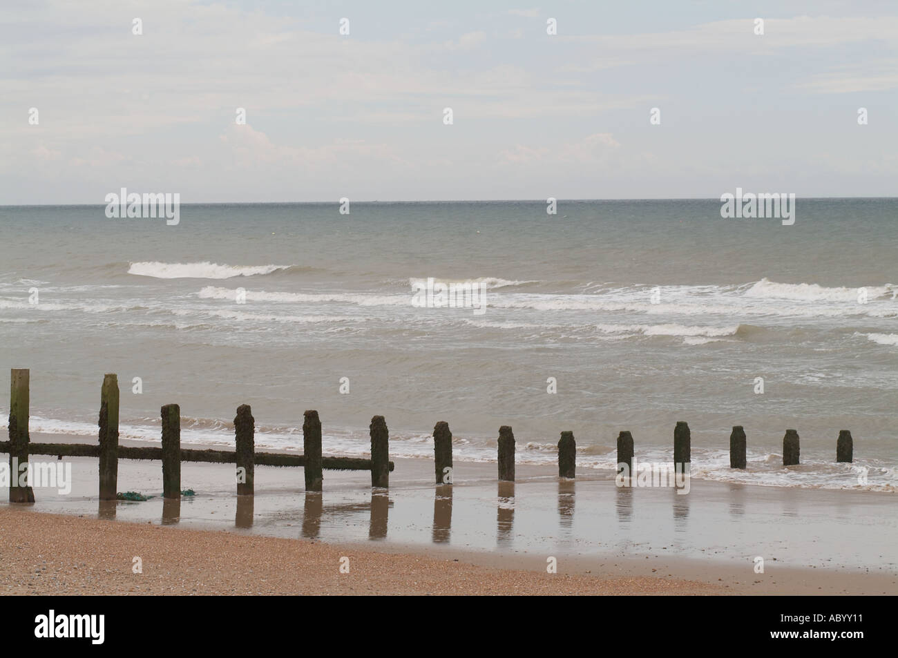 Depressing cold beach groynes break water hi-res stock photography and ...