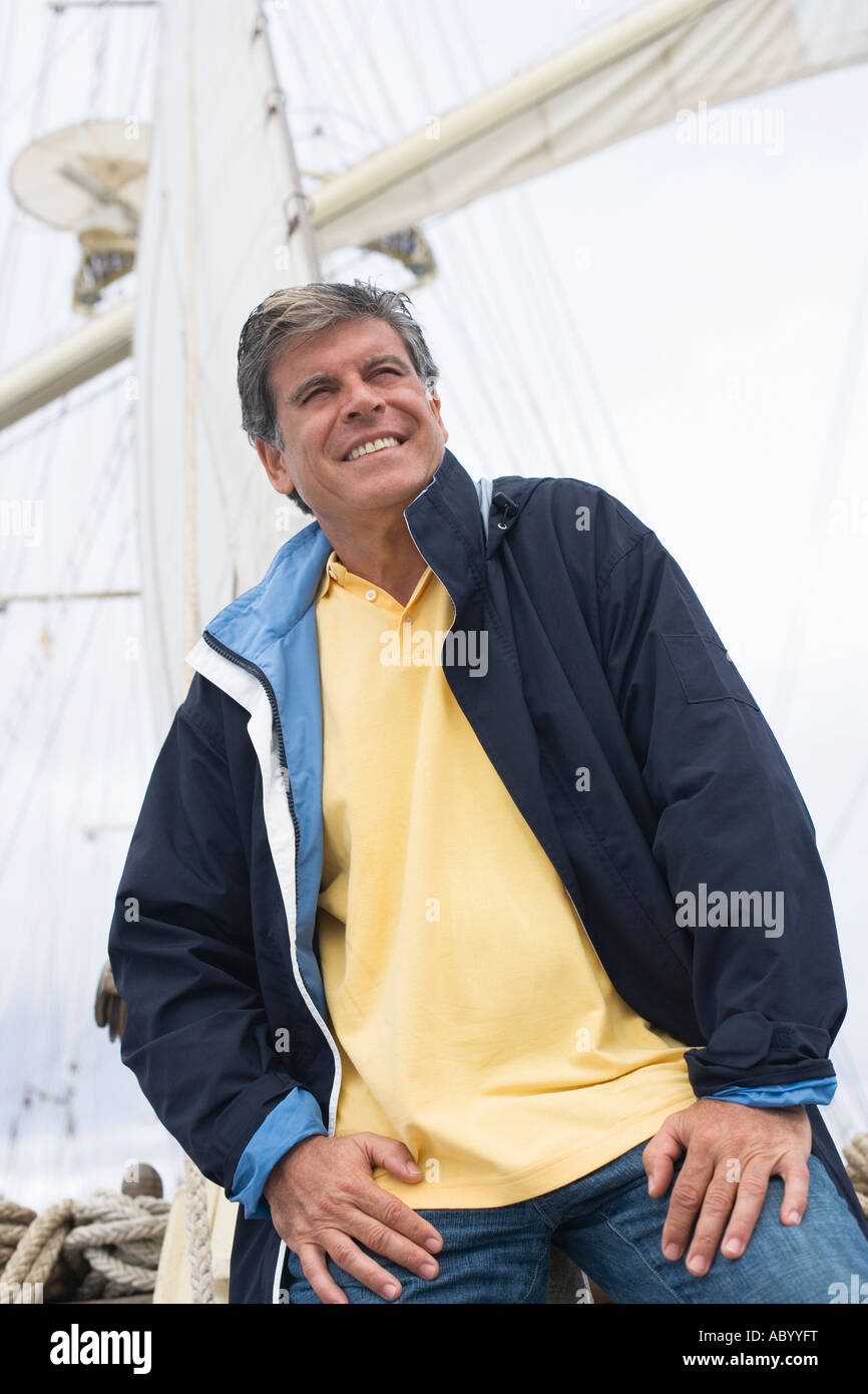 Man standing on ship’s deck Stock Photo - Alamy