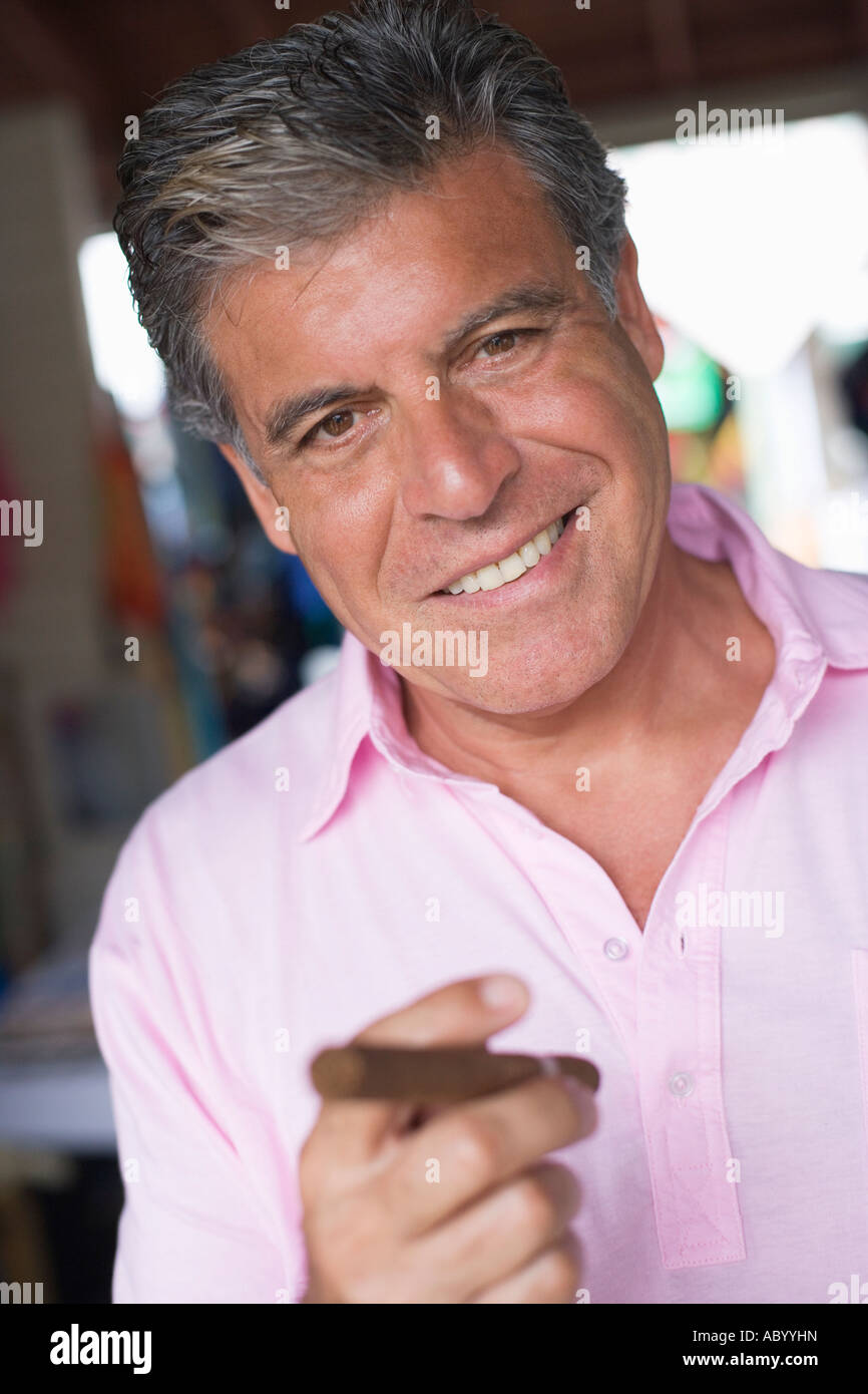 Man offering cigar Stock Photo - Alamy