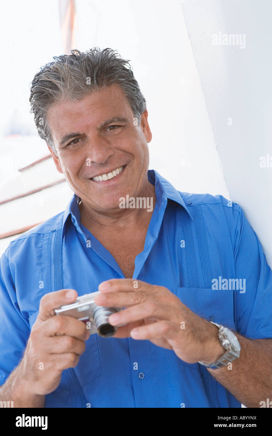 Man using digital camera Stock Photo - Alamy