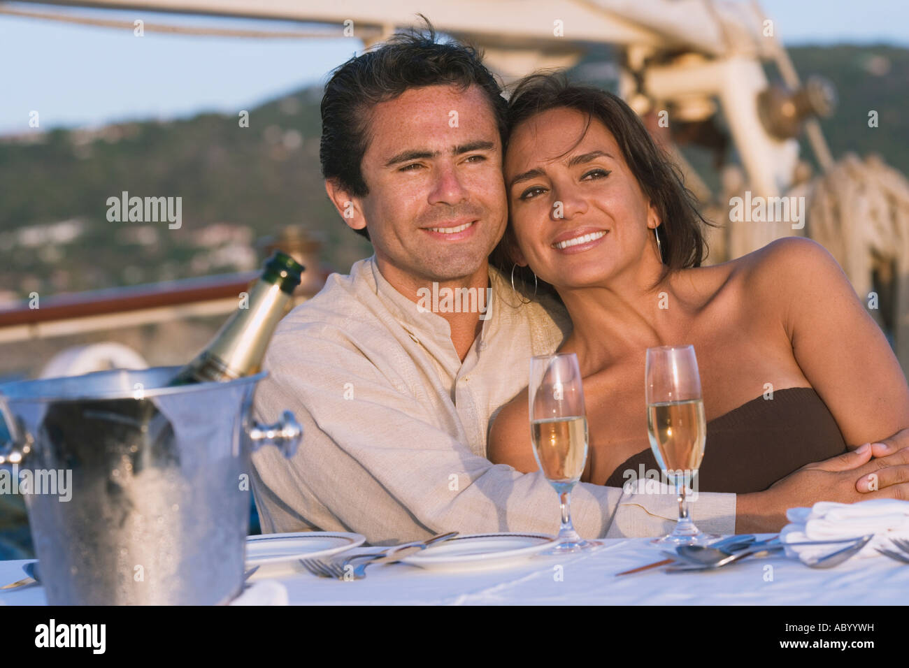 Couple having romantic dinner on boat deck Stock Photo - Alamy