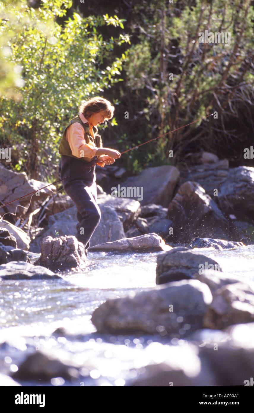 Woman single alone outdoors environment casting summer active lifestyle ...