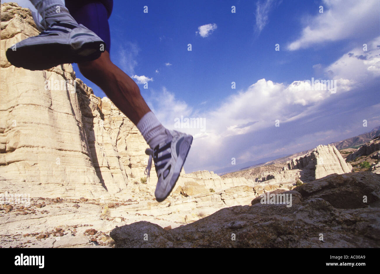 Runner jumping leaping hi-res stock photography and images - Alamy