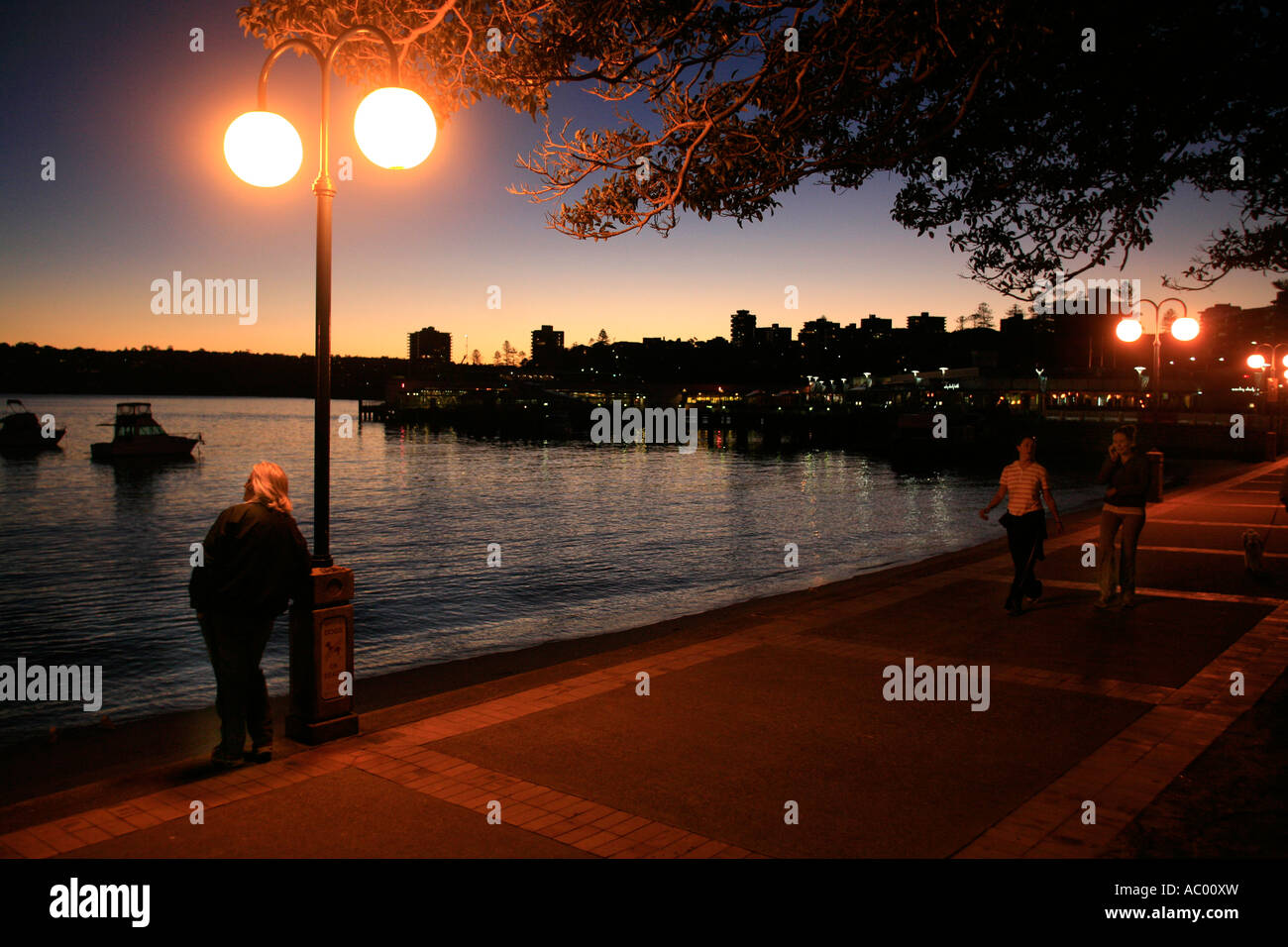 Manly's eastern esplanade at sunset Stock Photo - Alamy