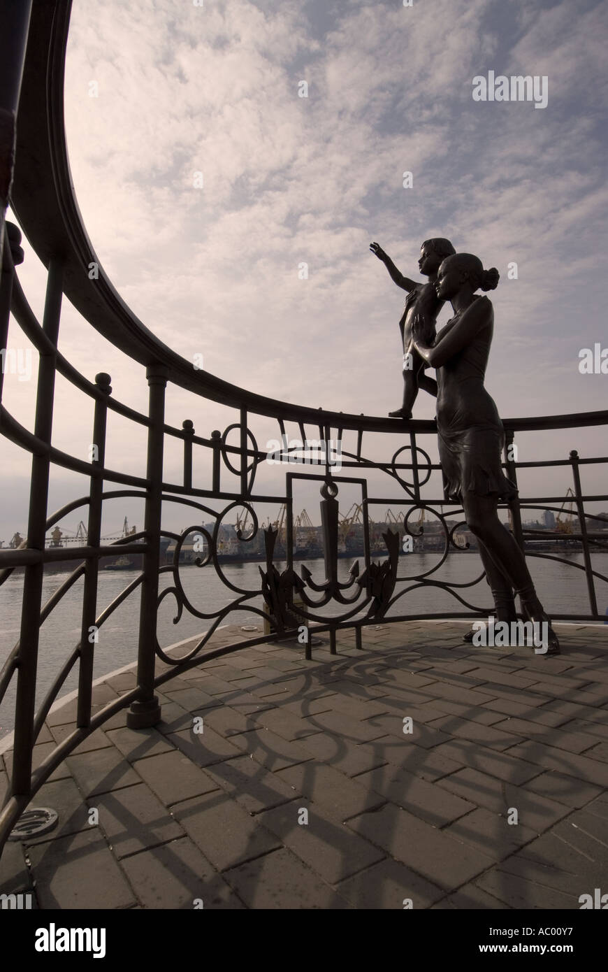 Bronze statue of a wife of a sailor and her child waving out to sea at ...