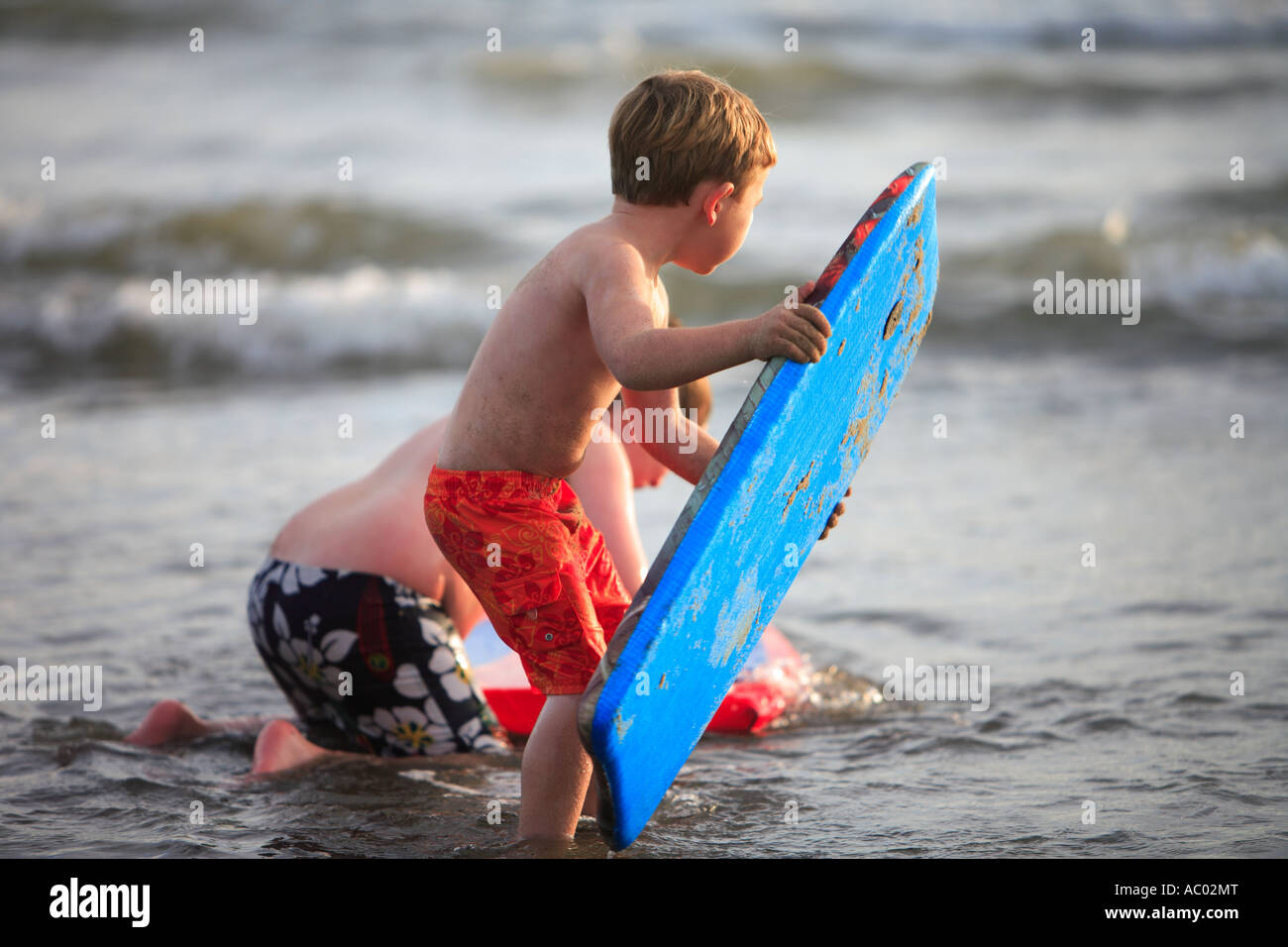 Family body boarding hi-res stock photography and images - Alamy