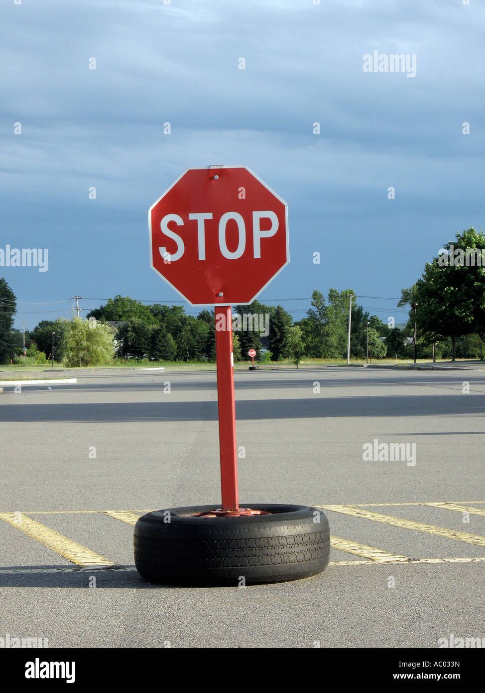 Stop sign on parking lot Stock Photo - Alamy