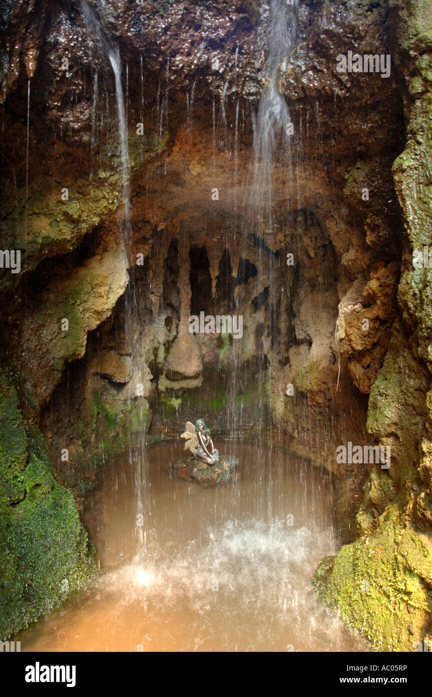 A FAIRY NYMPH BEHIND A WATERFALL IN THE TUFA GROTTO AT DEWSTOW GARDENS ...