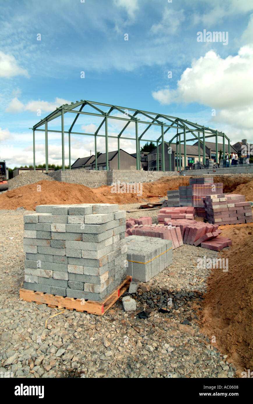 A structural steel frame for a new building is erected on a building ...