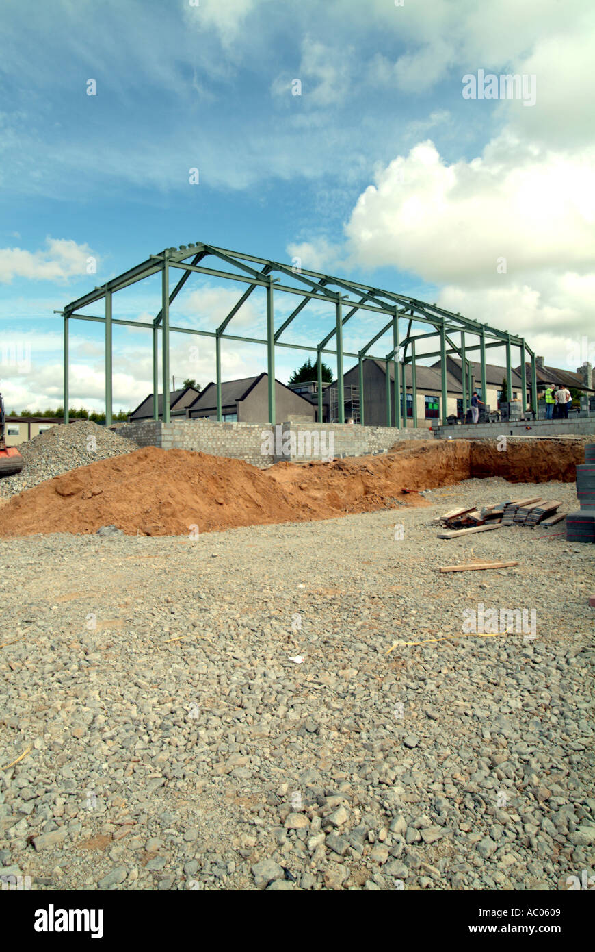 A structural steel frame for a new building is erected on a building ...