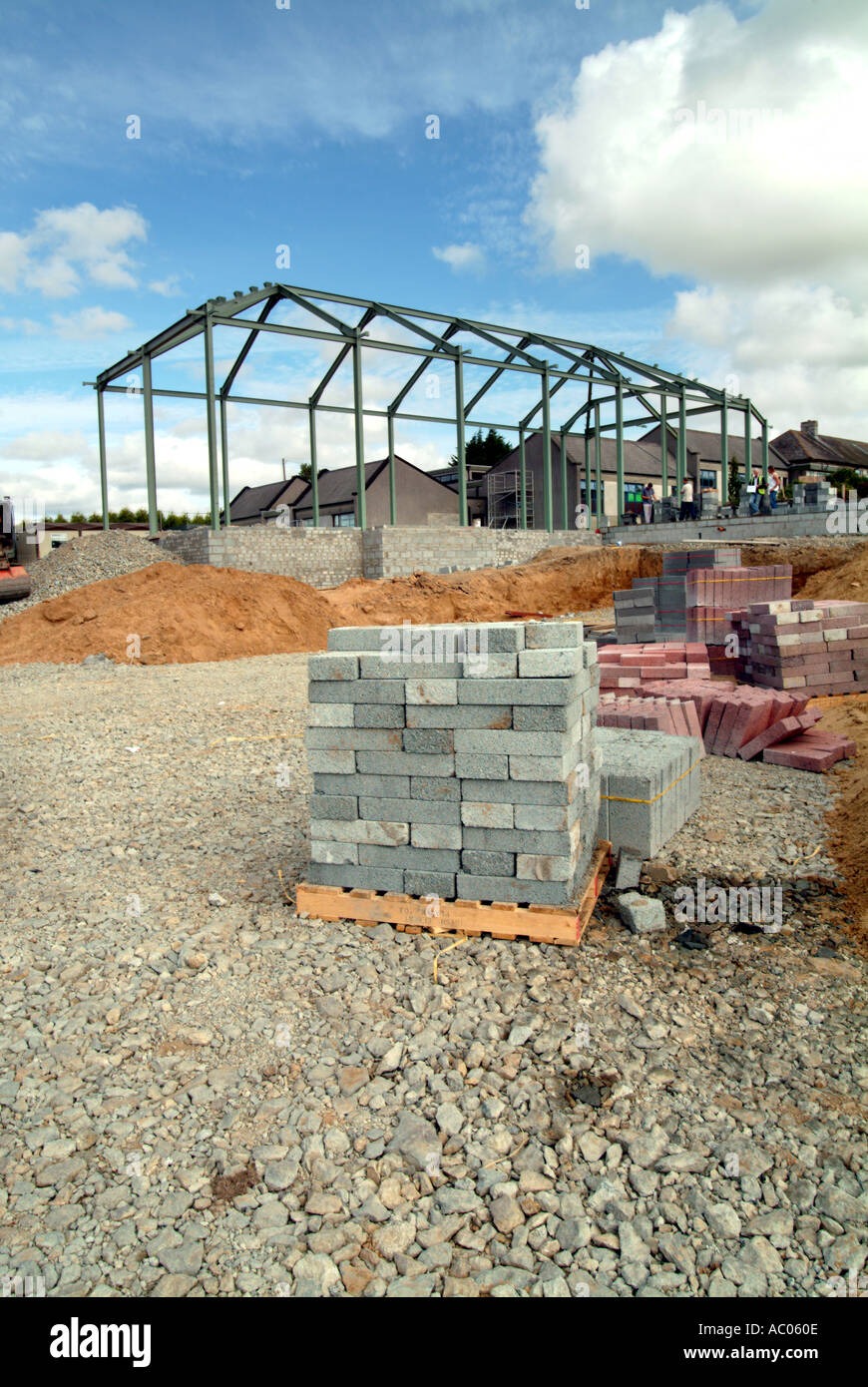 A structural steel frame for a new building is erected on a building ...