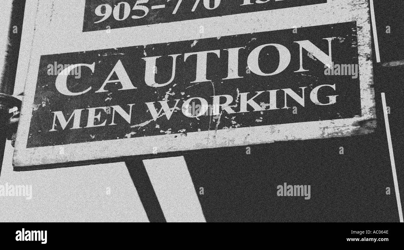 Men working sign Stock Photo - Alamy