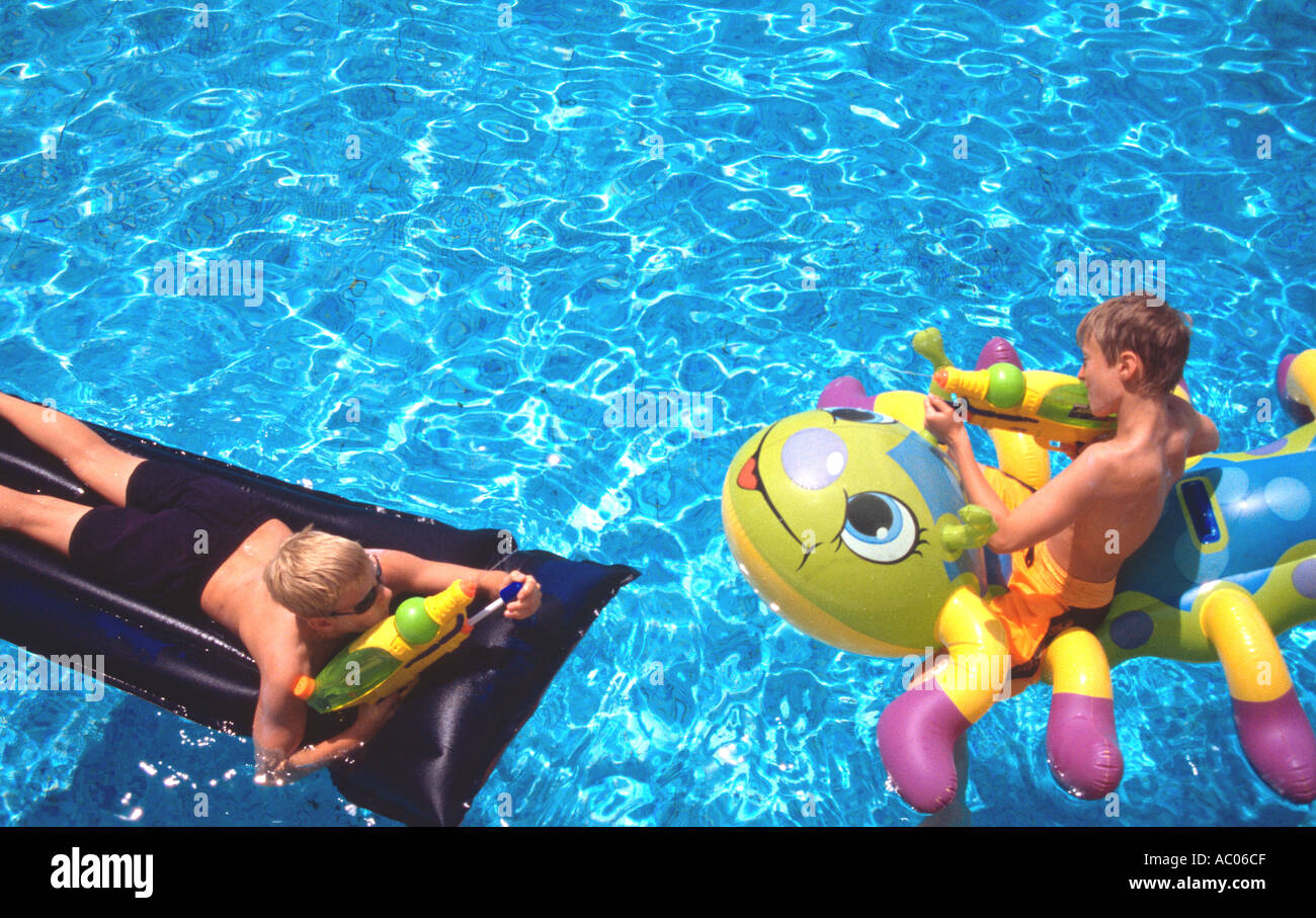 Children on lilos hi-res stock photography and images - Alamy