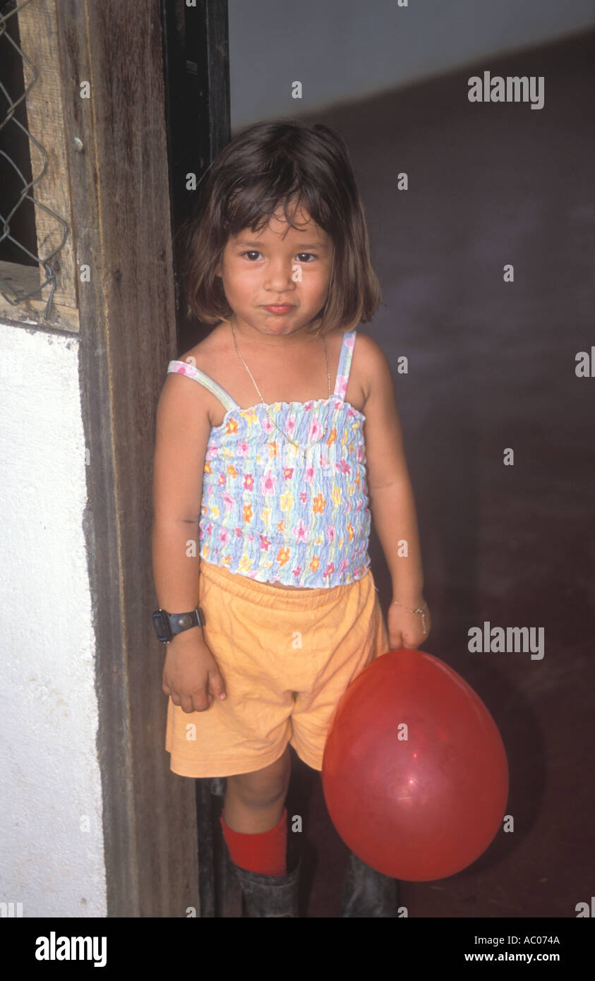 Costa Rican girl at door of rural school house near Pital Costa Rica ...