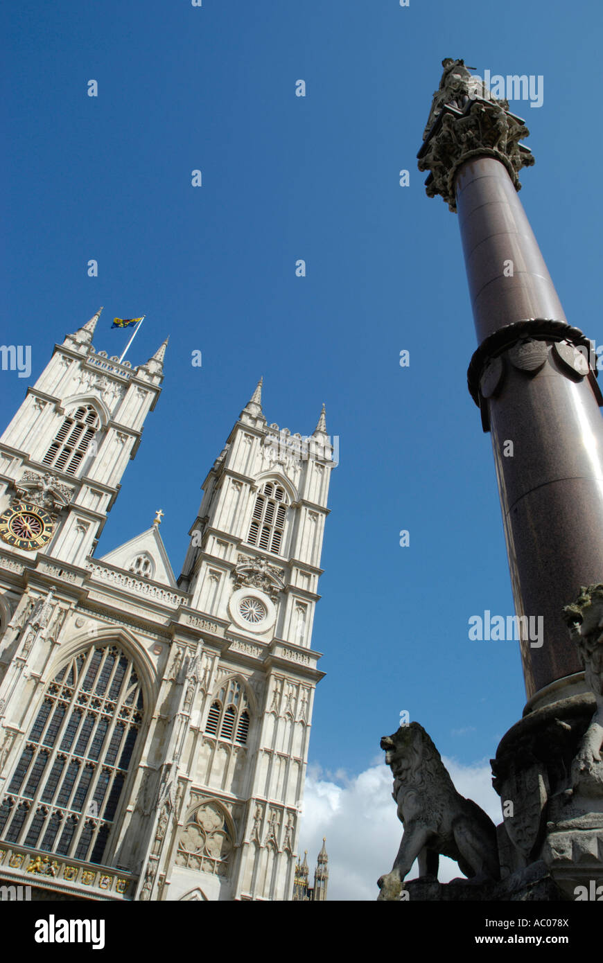 Front (West) facade of Westminster Abbey and nearby memorial column ...