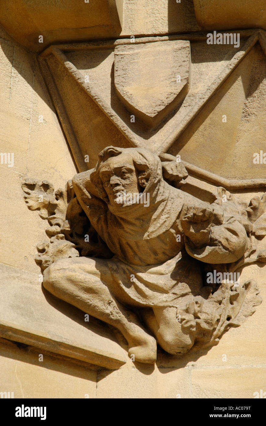 Carving of contorted monk on exterior wall of Westminster Abbey deanery ...